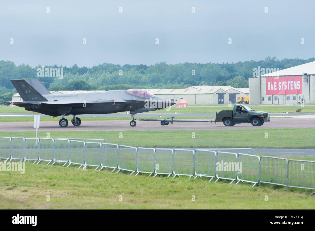 f35 lockheed martin jet being towed to the runway Stock Photo - Alamy