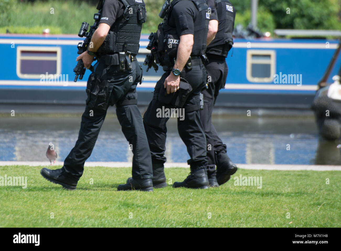 UK armed police patrolling english town after terror alert with river ...
