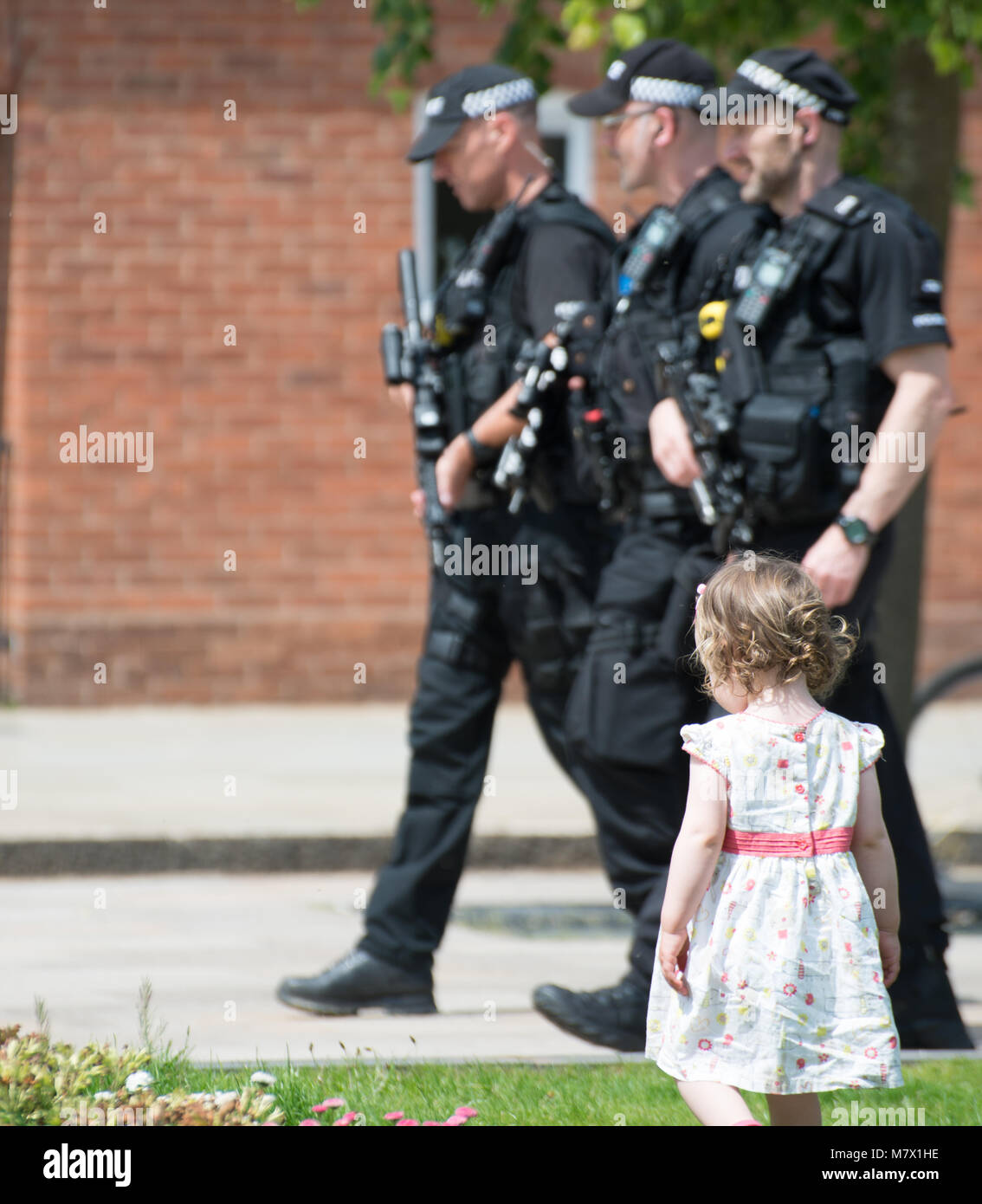 UK armed police patrolling english town after terror alert Stock Photo ...