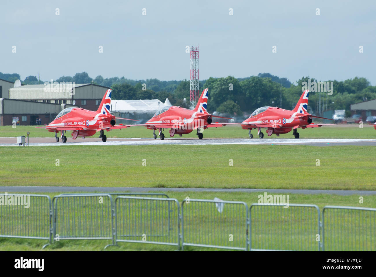 red arrows sat on runway at airfield Stock Photo - Alamy
