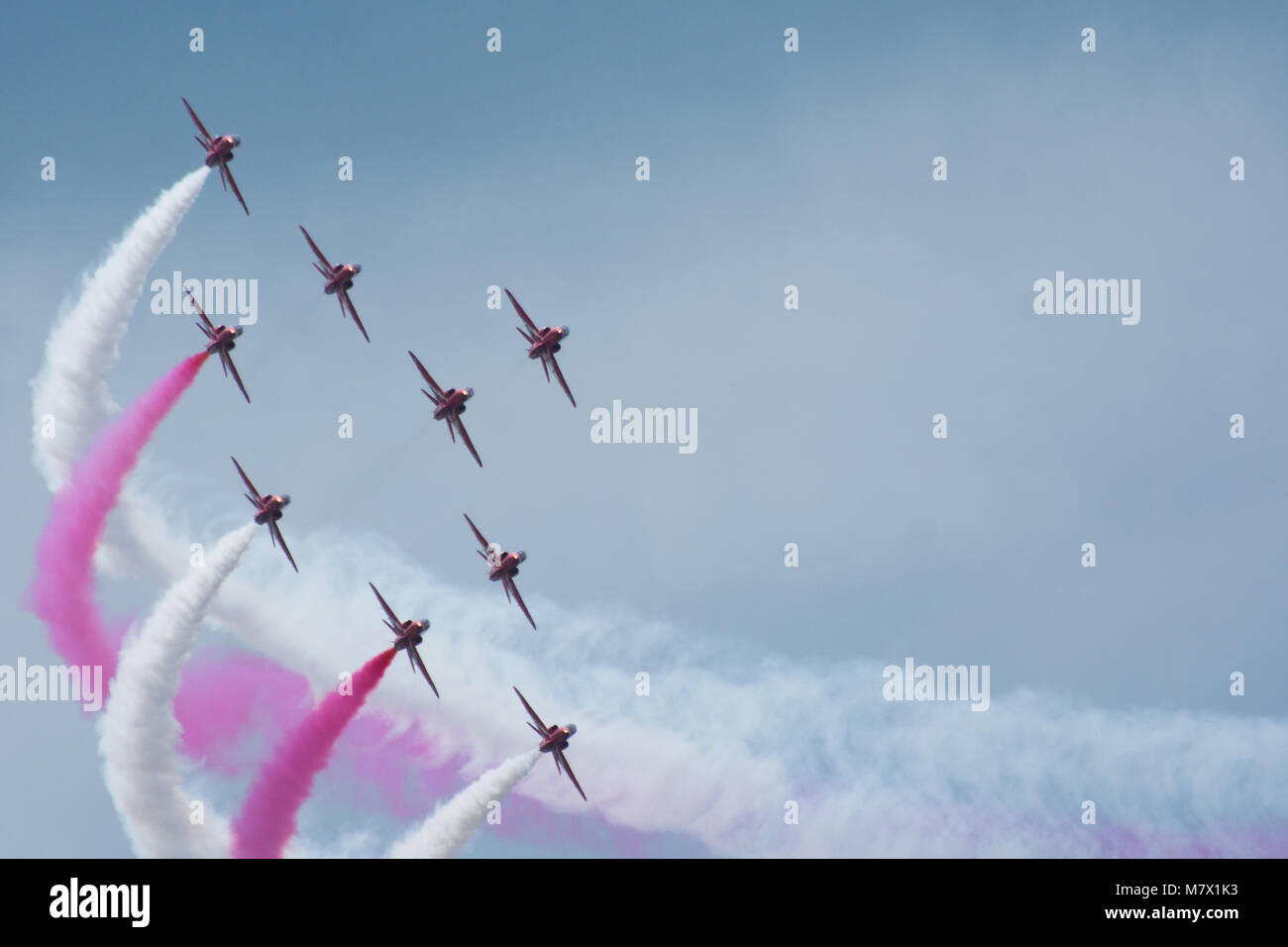 RAF red arrows aerobatic display team flying in formation Stock Photo ...