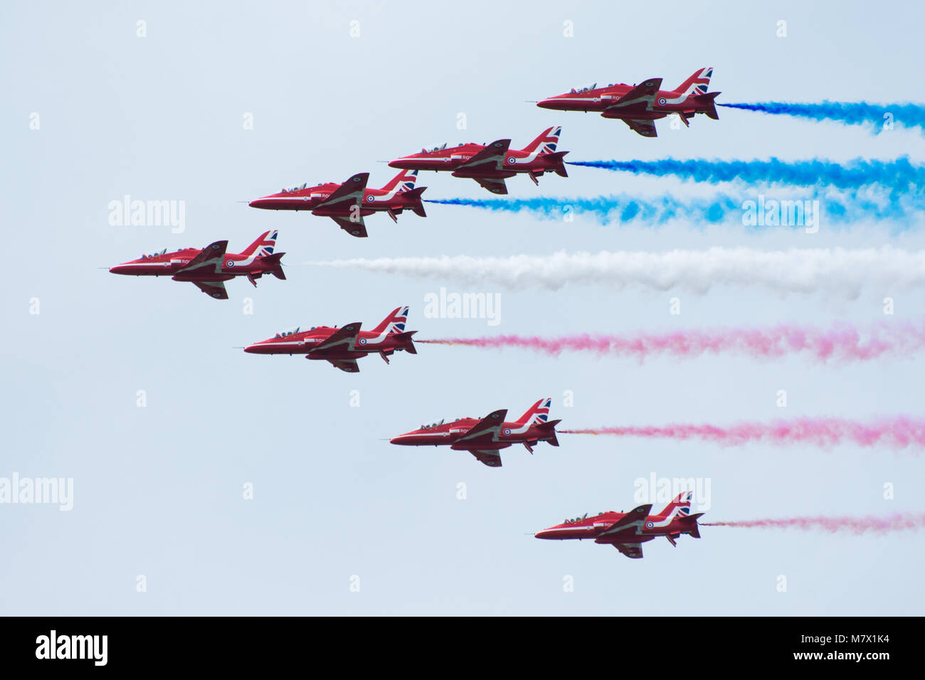 RAF red arrows aerobatic display team flying in formation Stock Photo ...