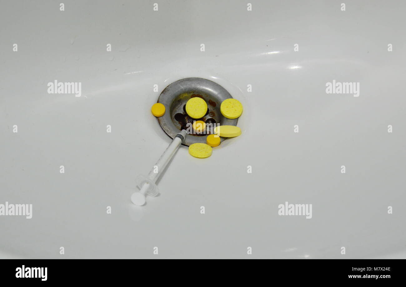 drug and syringe on white sink Stock Photo - Alamy