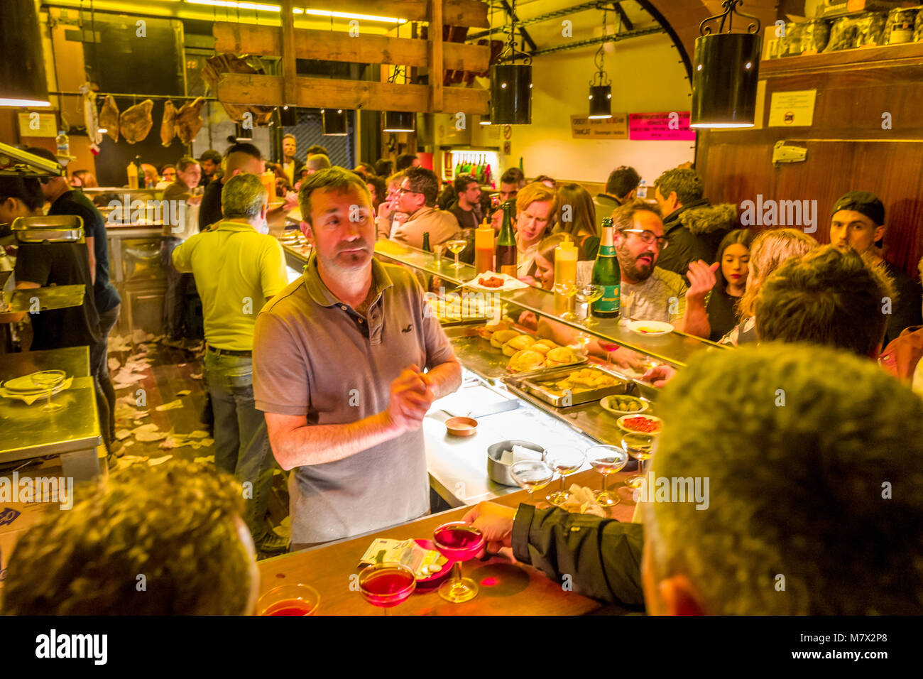 A busy bar in Barcelona Stock Photo - Alamy