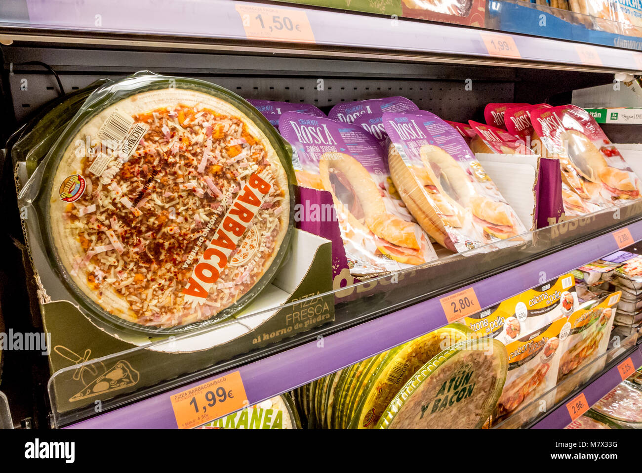 Excessive packaging in a Barcelona supermarket Stock Photo - Alamy