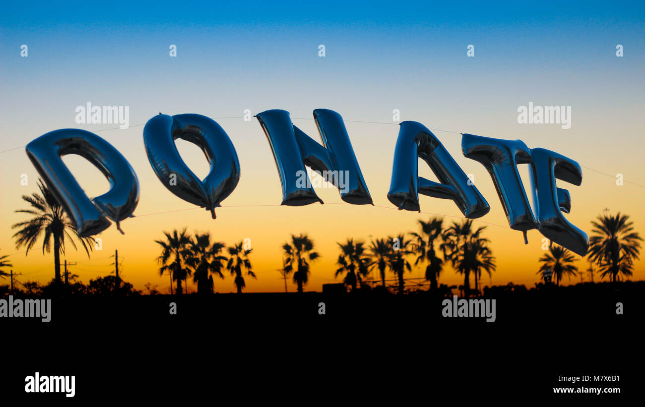 Donate here sign hi-res stock photography and images - Alamy