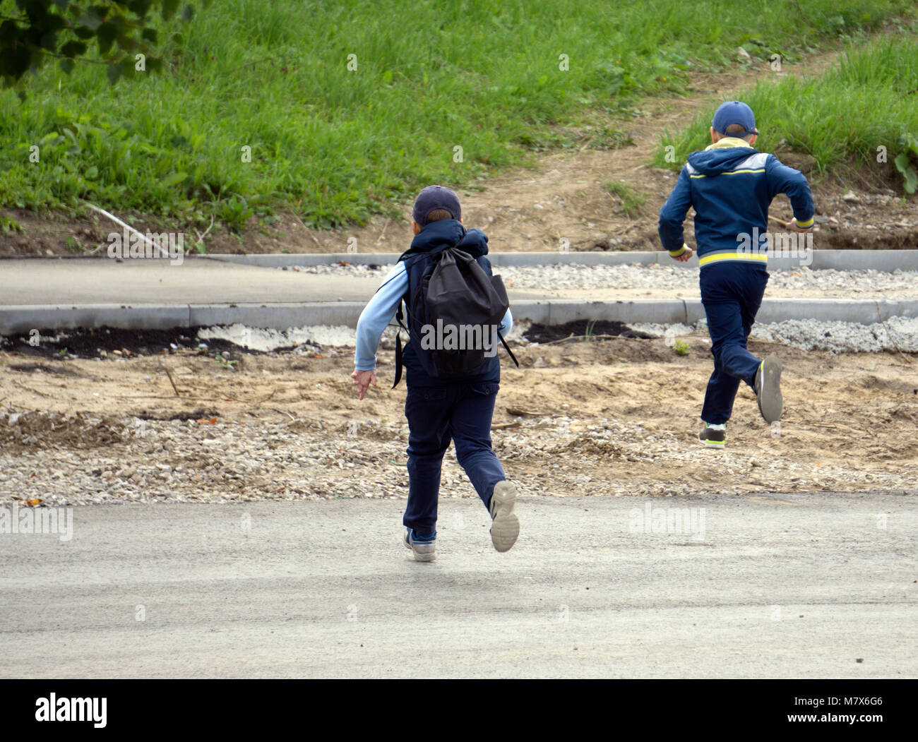 Children Run Across The Road High Resolution Stock Photography and ...