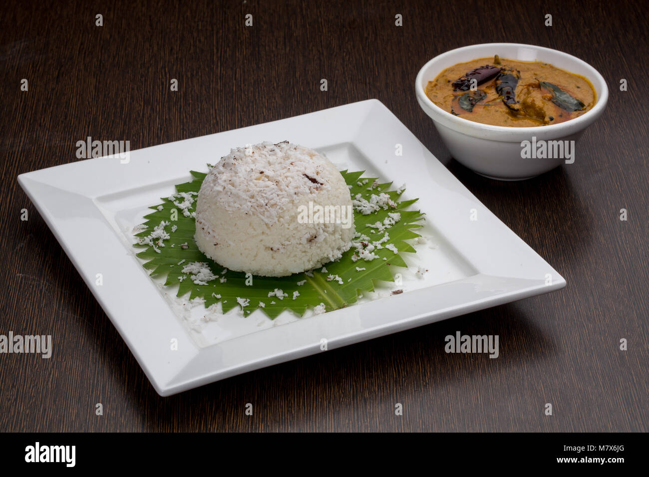 puttu with fish curry Stock Photo - Alamy