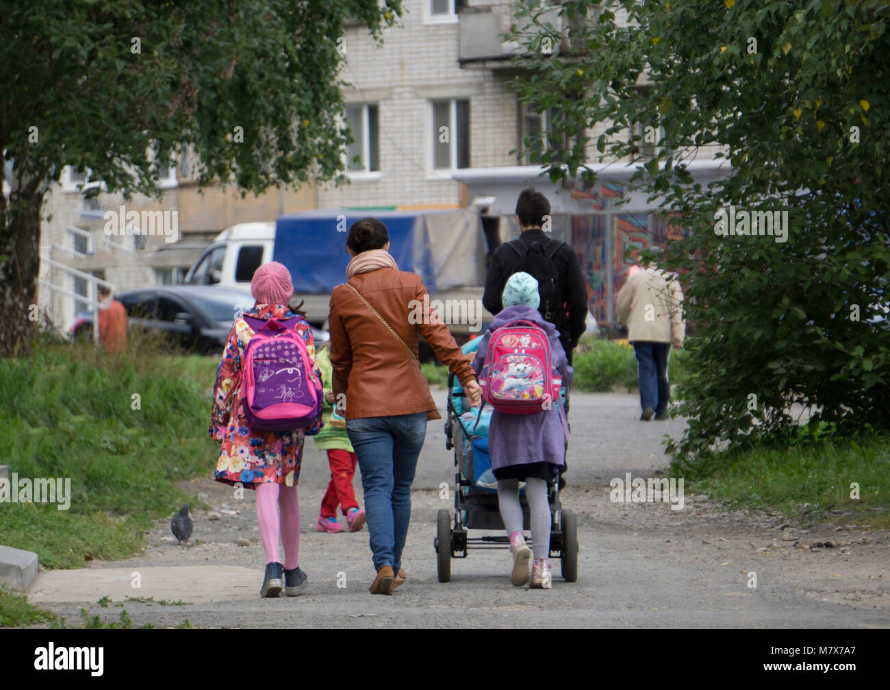 Come back home from school. Family enjoy after kids coming back Stock ...