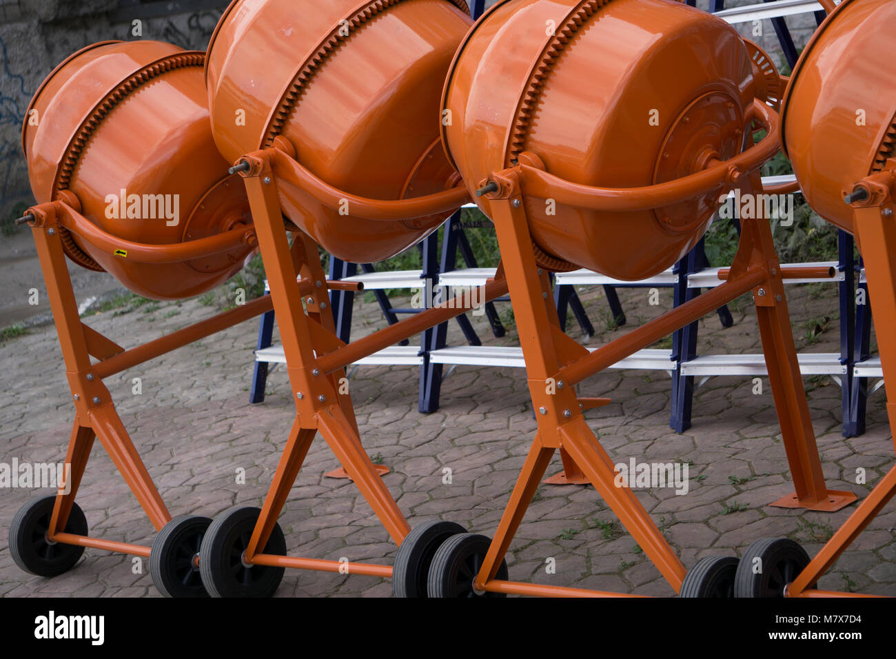 orange concrete mixer on wheels Stock Photo - Alamy