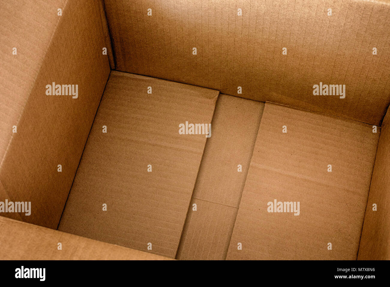 Empty open cardboard box. Close up Stock Photo - Alamy