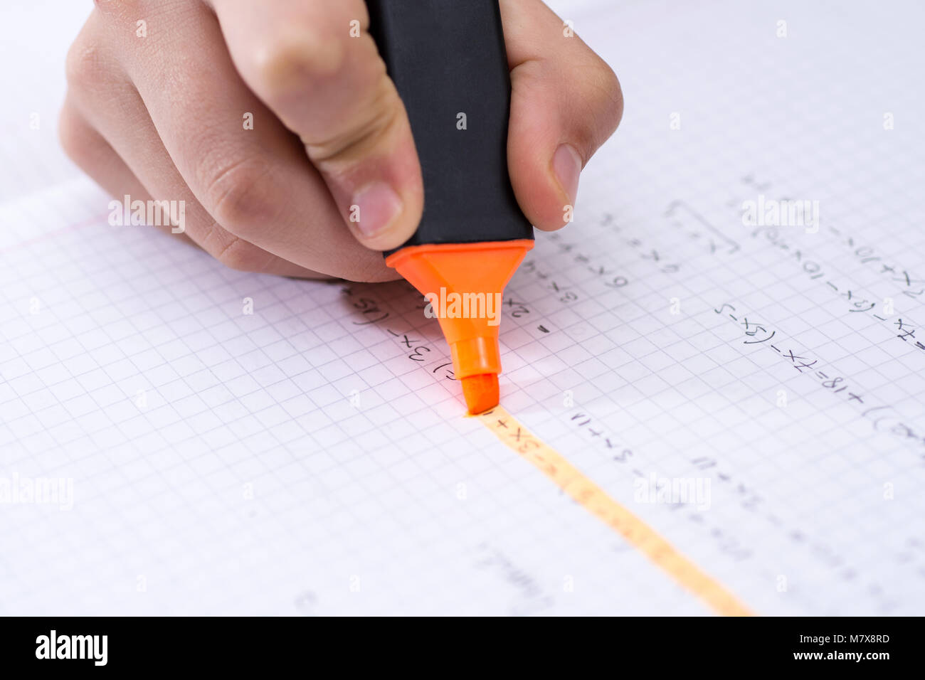 Highlighter in Childrens Hand Marked Text in Notebook. School Concept ...