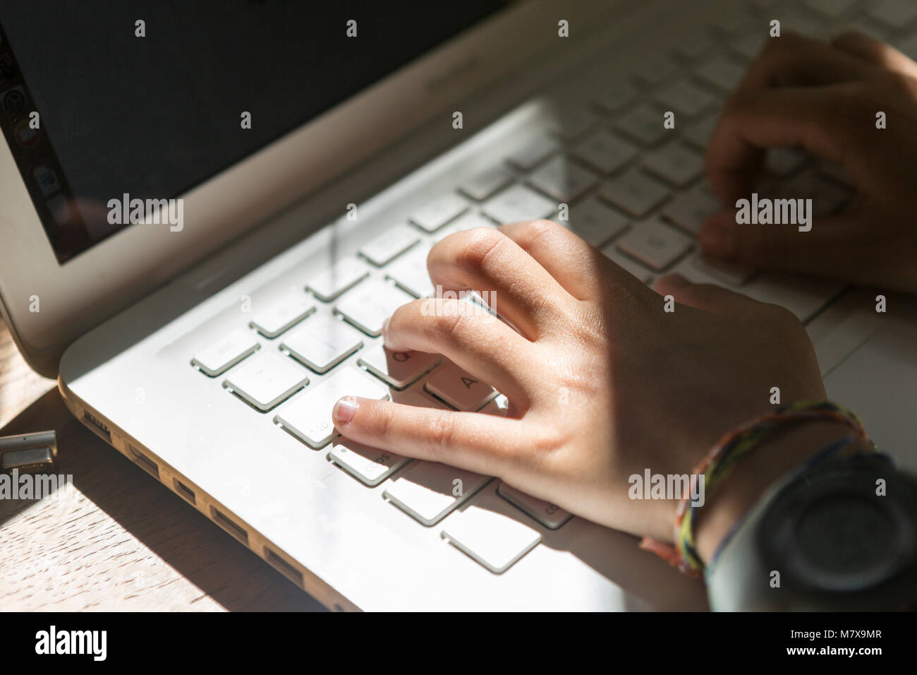 Child learning letters at home laptop hi-res stock photography and ...