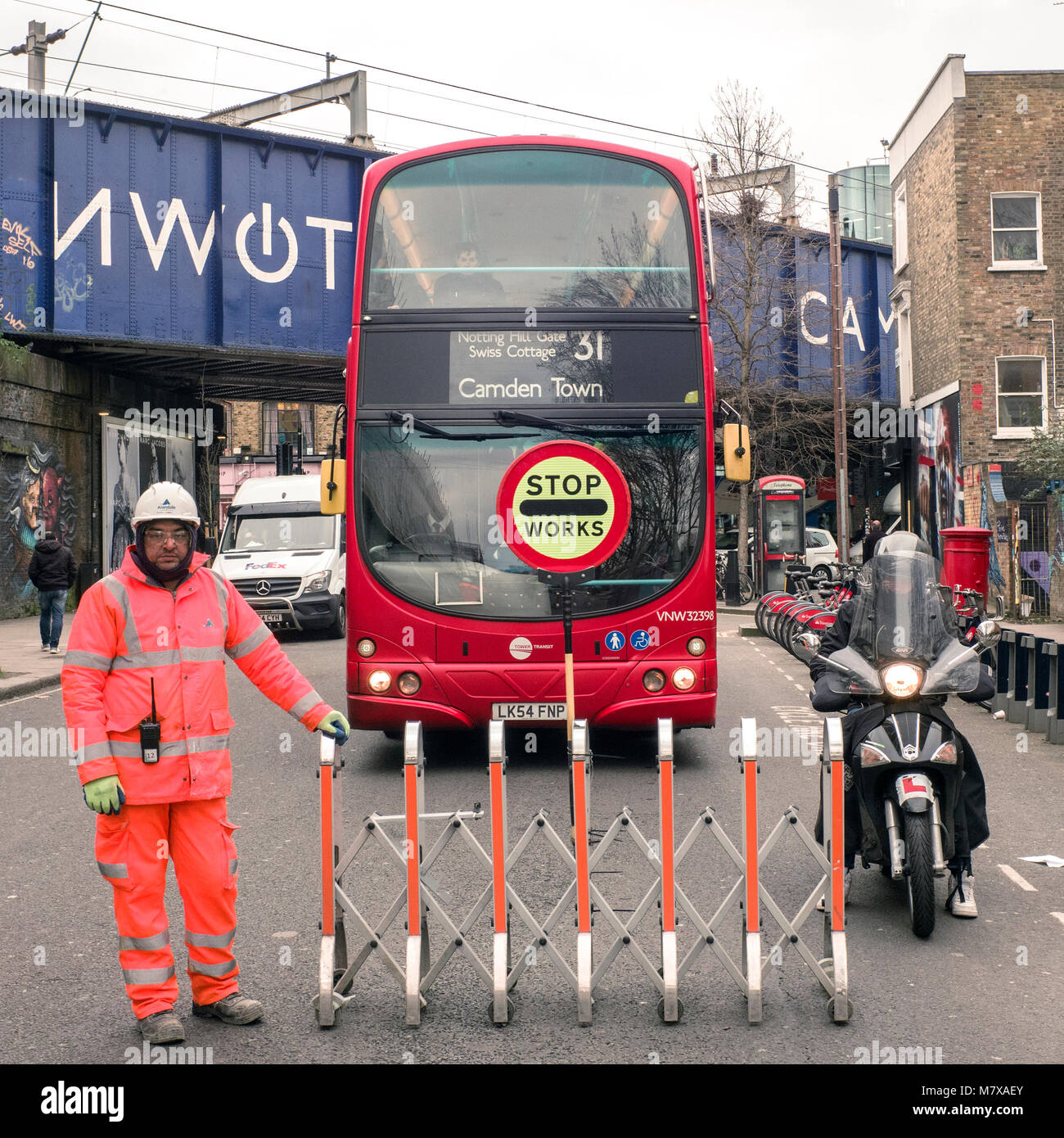 London double decker bus. number 31. Accordion barrier gate a ...