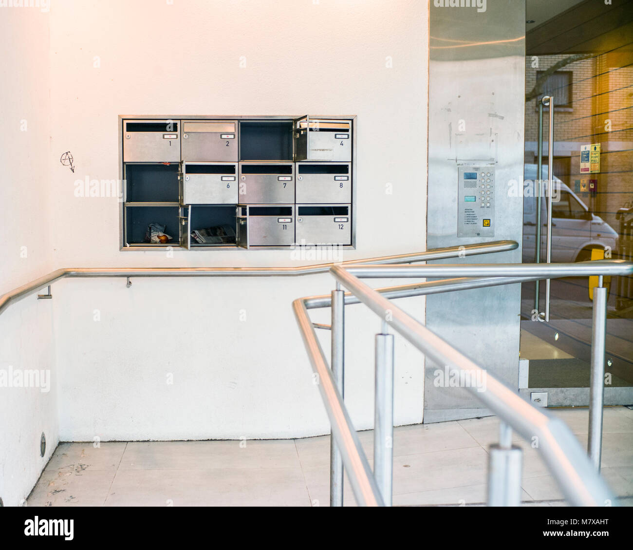 Mail post boxes in apartment hi-res stock photography and images - Alamy