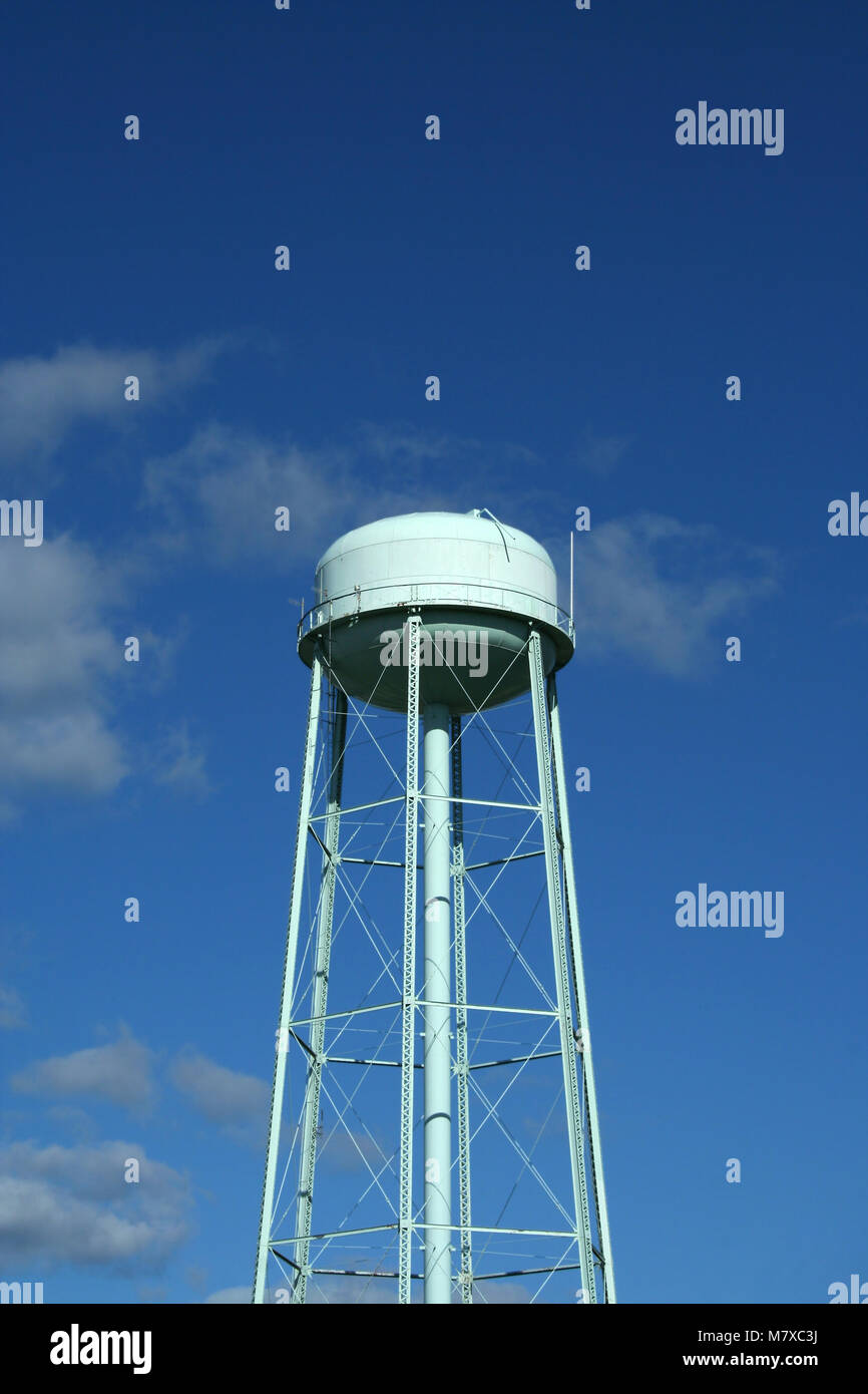 Blue water Tower against blue sky Stock Photo - Alamy