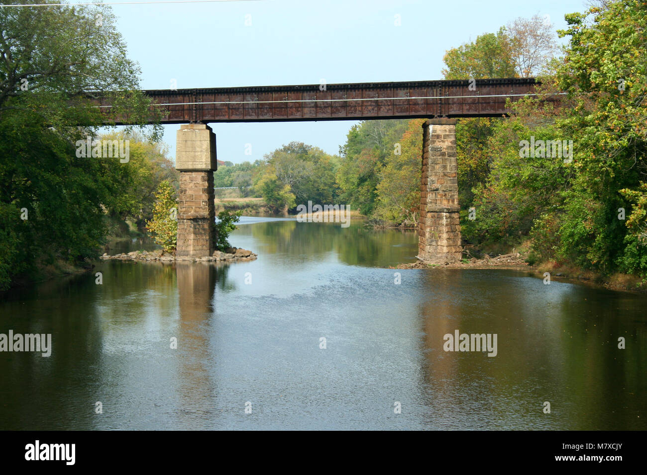 A Train Tressel over a river with support columns Stock Photo - Alamy