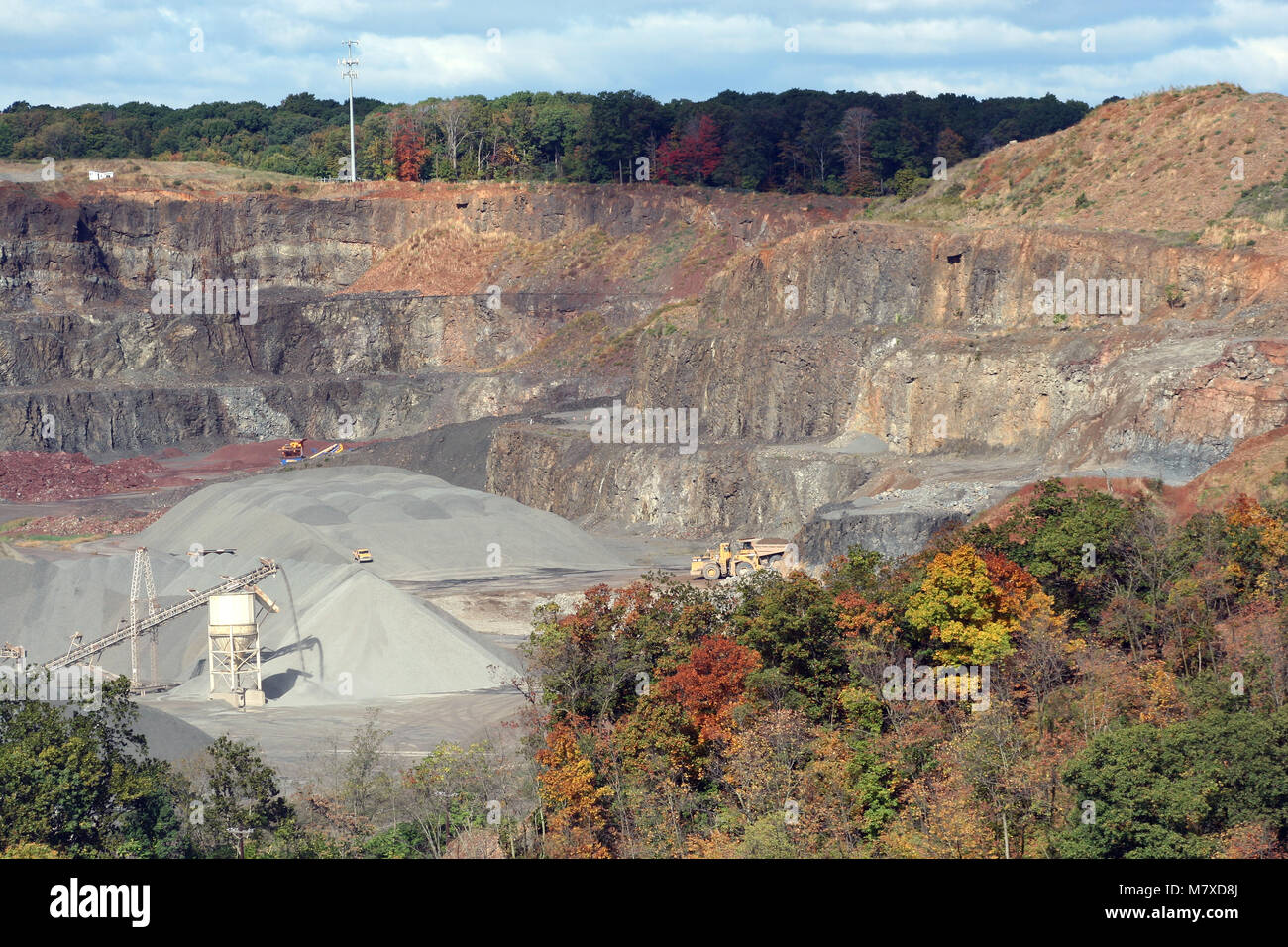 A Rock Quarry with tower and truck Stock Photo - Alamy