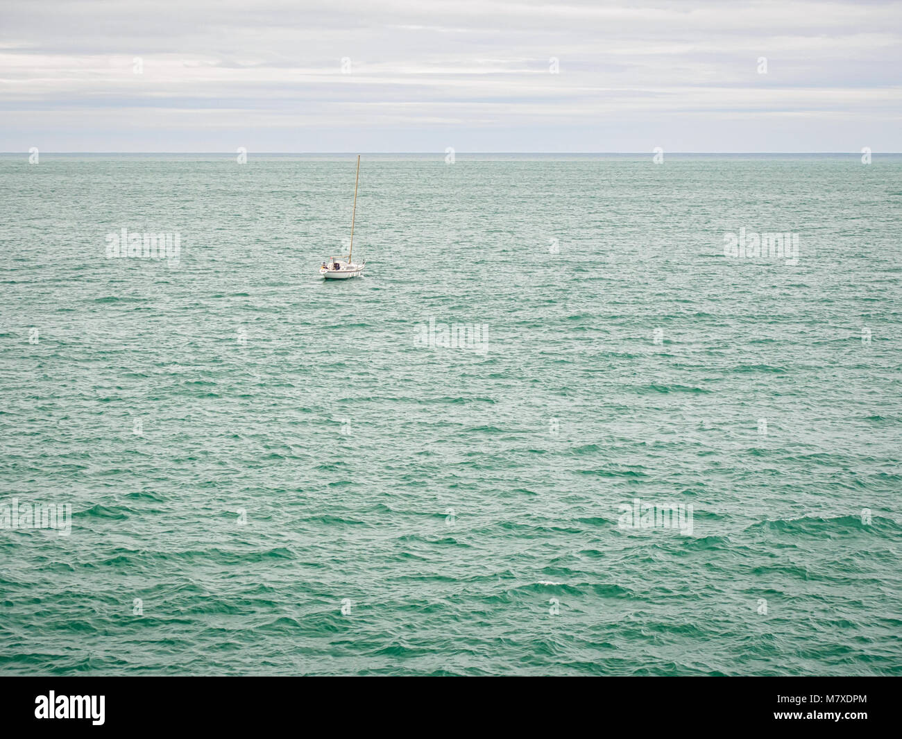 Lonely boat ocean hi-res stock photography and images - Alamy