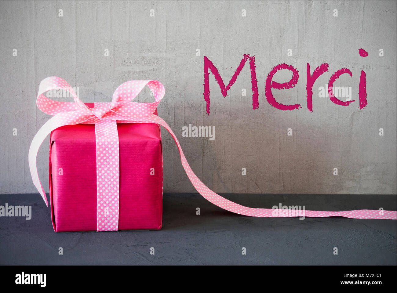Pink Present, Merci Means Thank You Stock Photo - Alamy