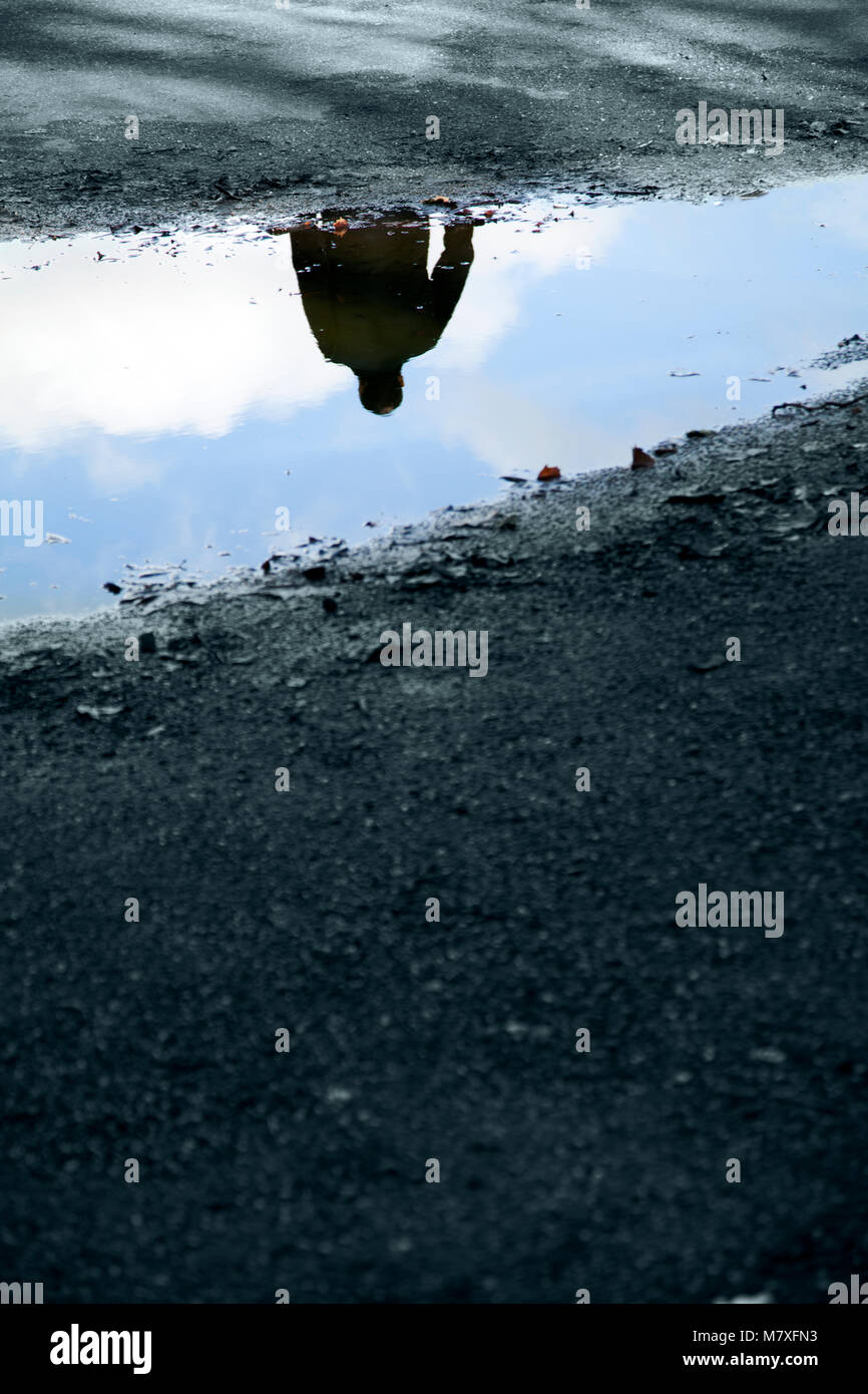 Man Reflection in Puddle Stock Photo - Alamy
