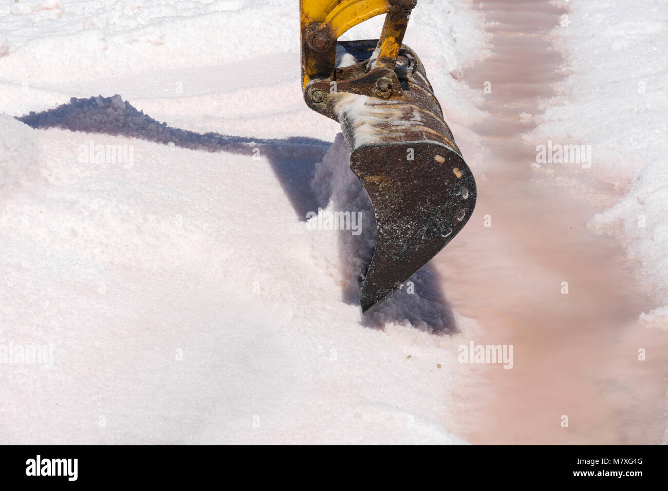 scraper at work at saltworks of Trapani in Sicily in Italy Stock Photo ...
