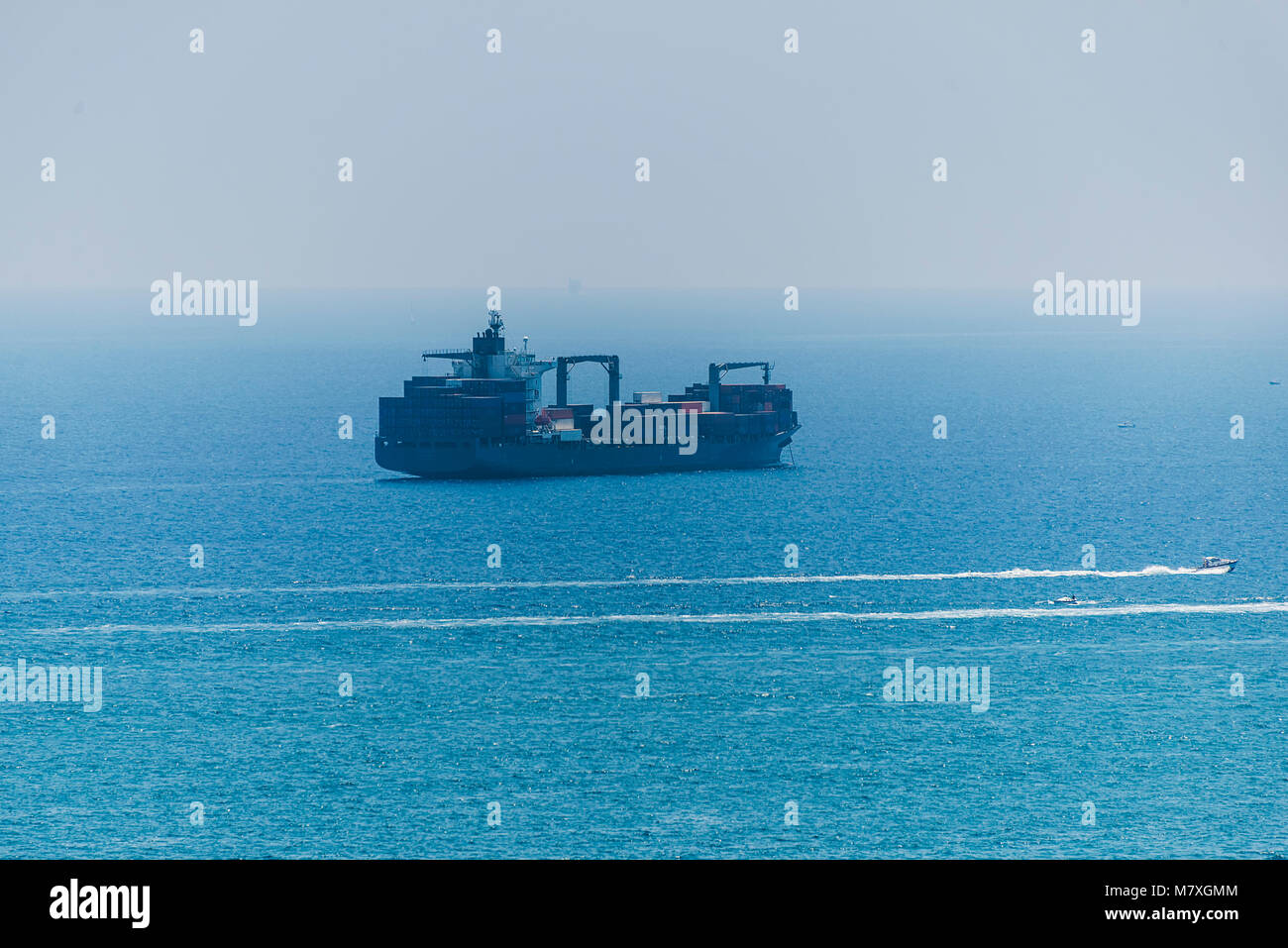 Cargo ship in the roadstead Stock Photo - Alamy