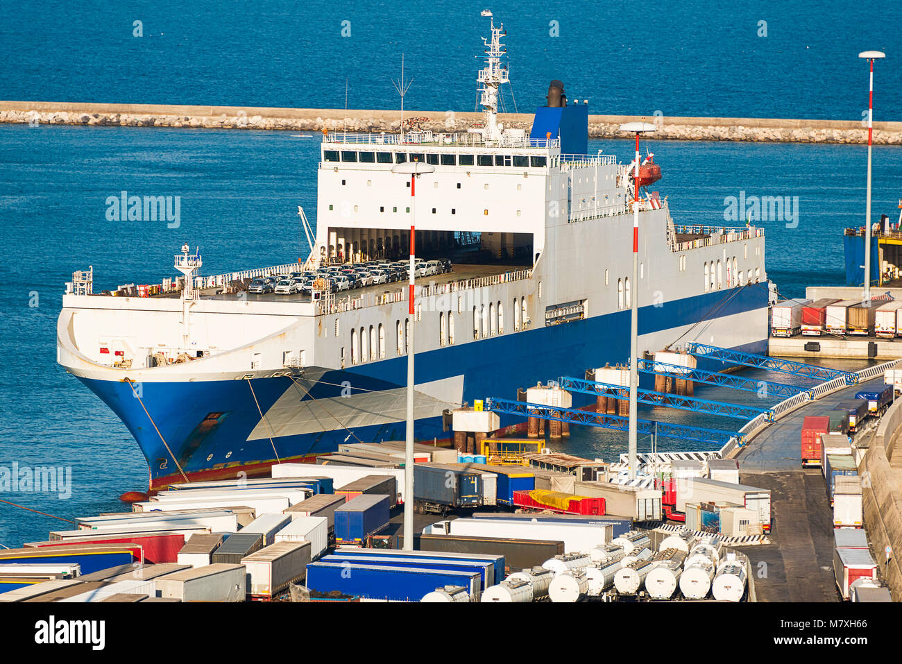 View of the cargo ferry at the pier Stock Photo - Alamy