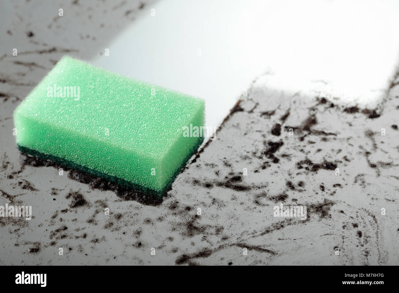 Dirty glass and a sponge . Copy space for your text Stock Photo - Alamy