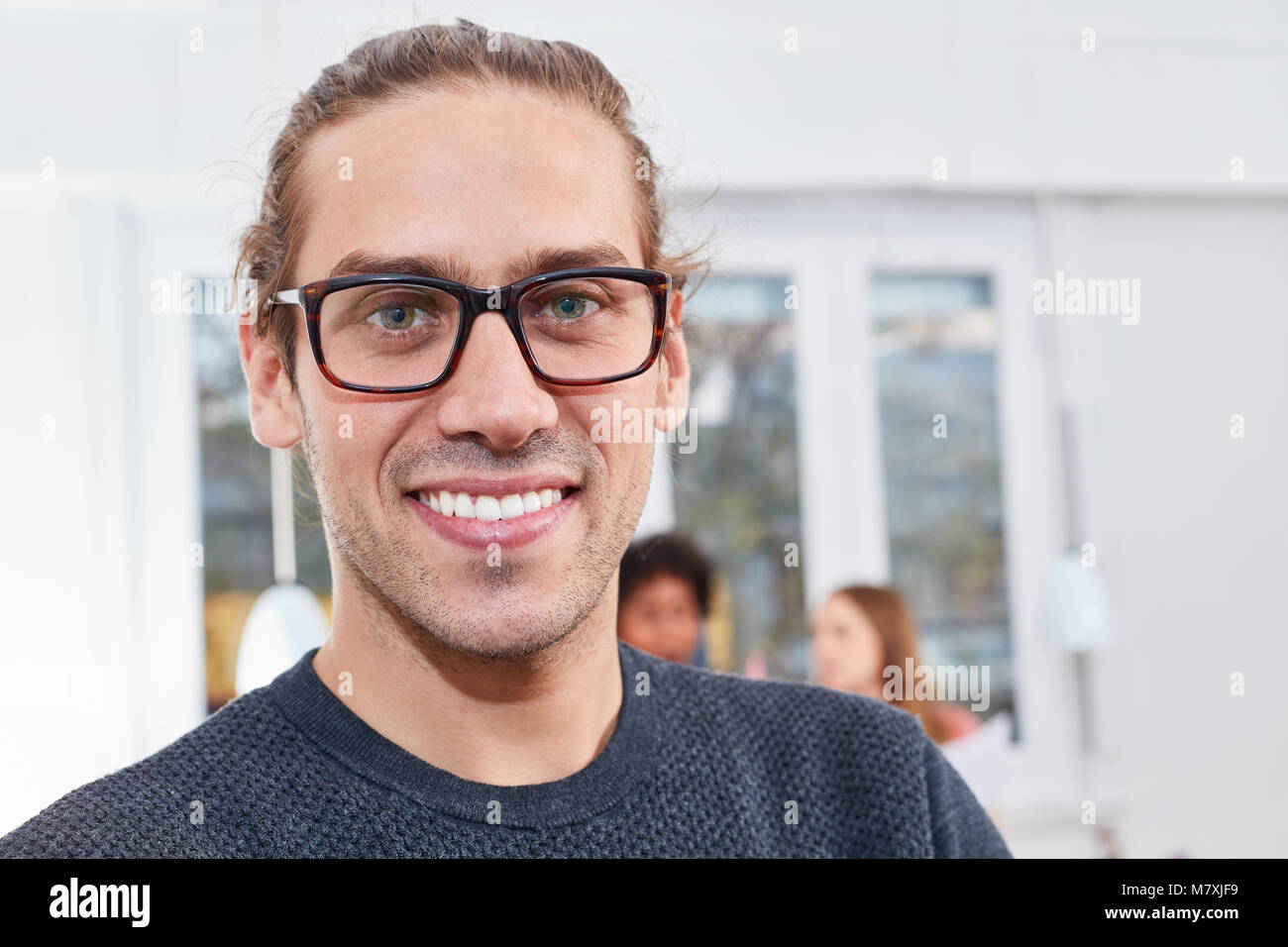 Young student as a successful entrepreneur or programmer Stock Photo ...