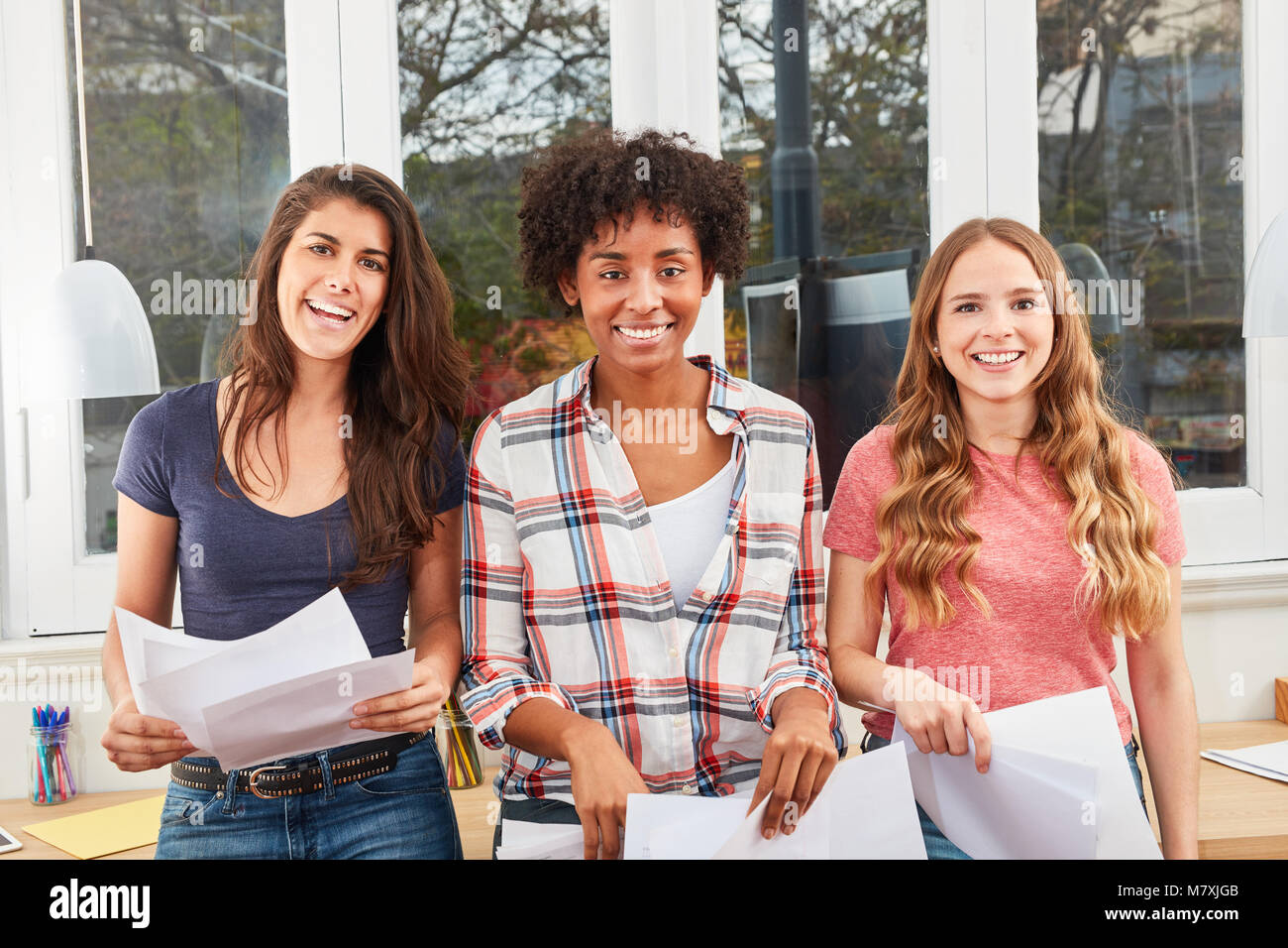 Happy company young friends in hi-res stock photography and images - Alamy