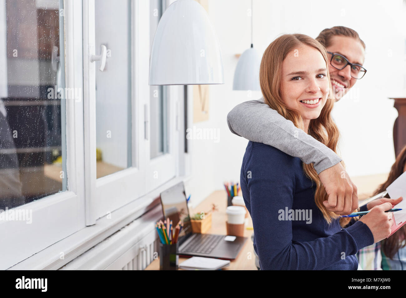 Office man hug hi-res stock photography and images - Alamy