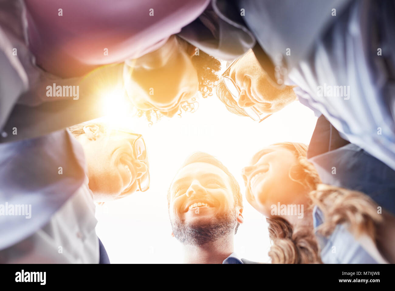 Cooperation in the business team with happy business people Stock Photo ...