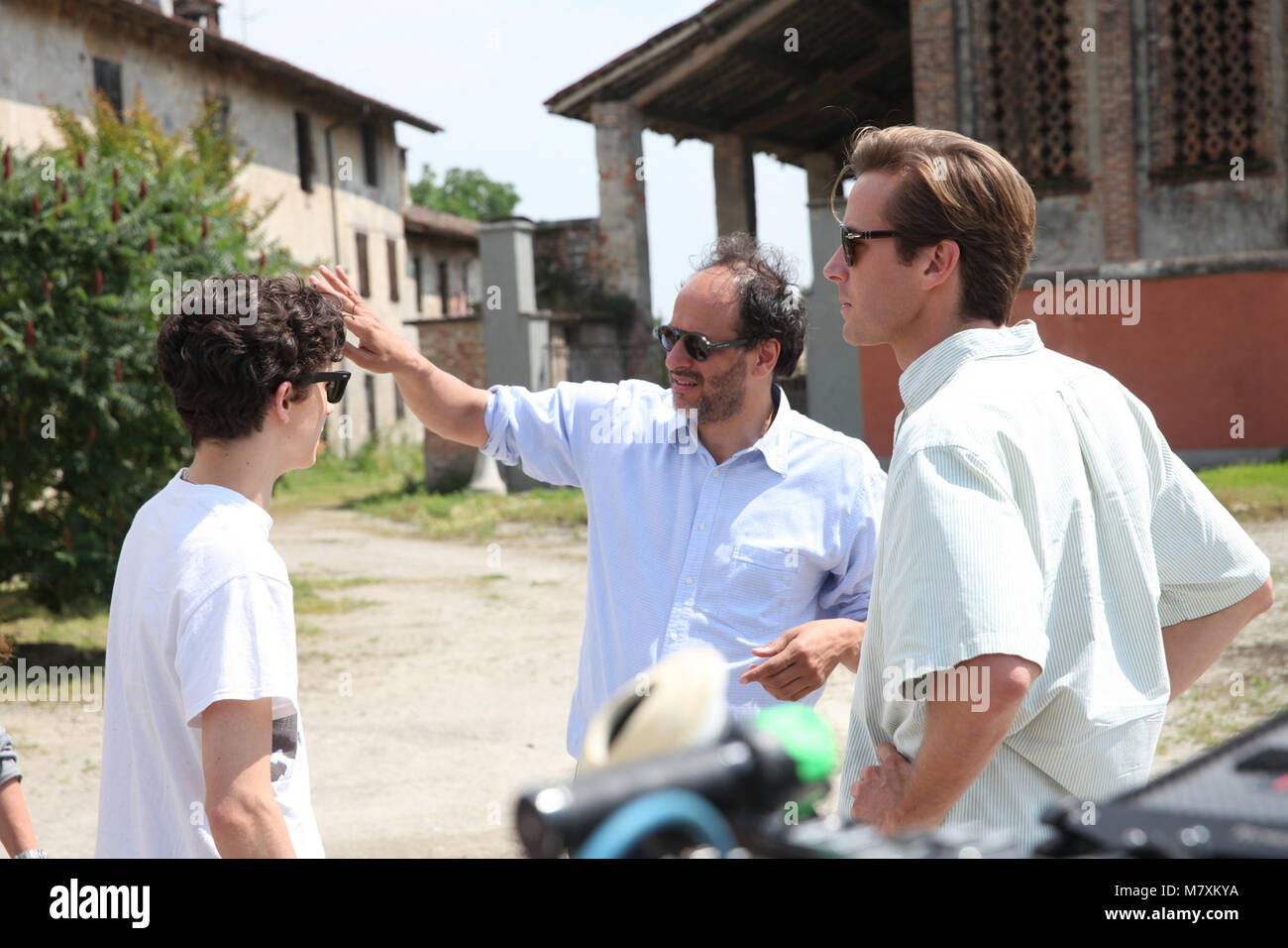 CALL ME BY YOUR NAME, from left: Timothee Chalamet, director Luca Guadagnino, Armie Hammer, on ...
