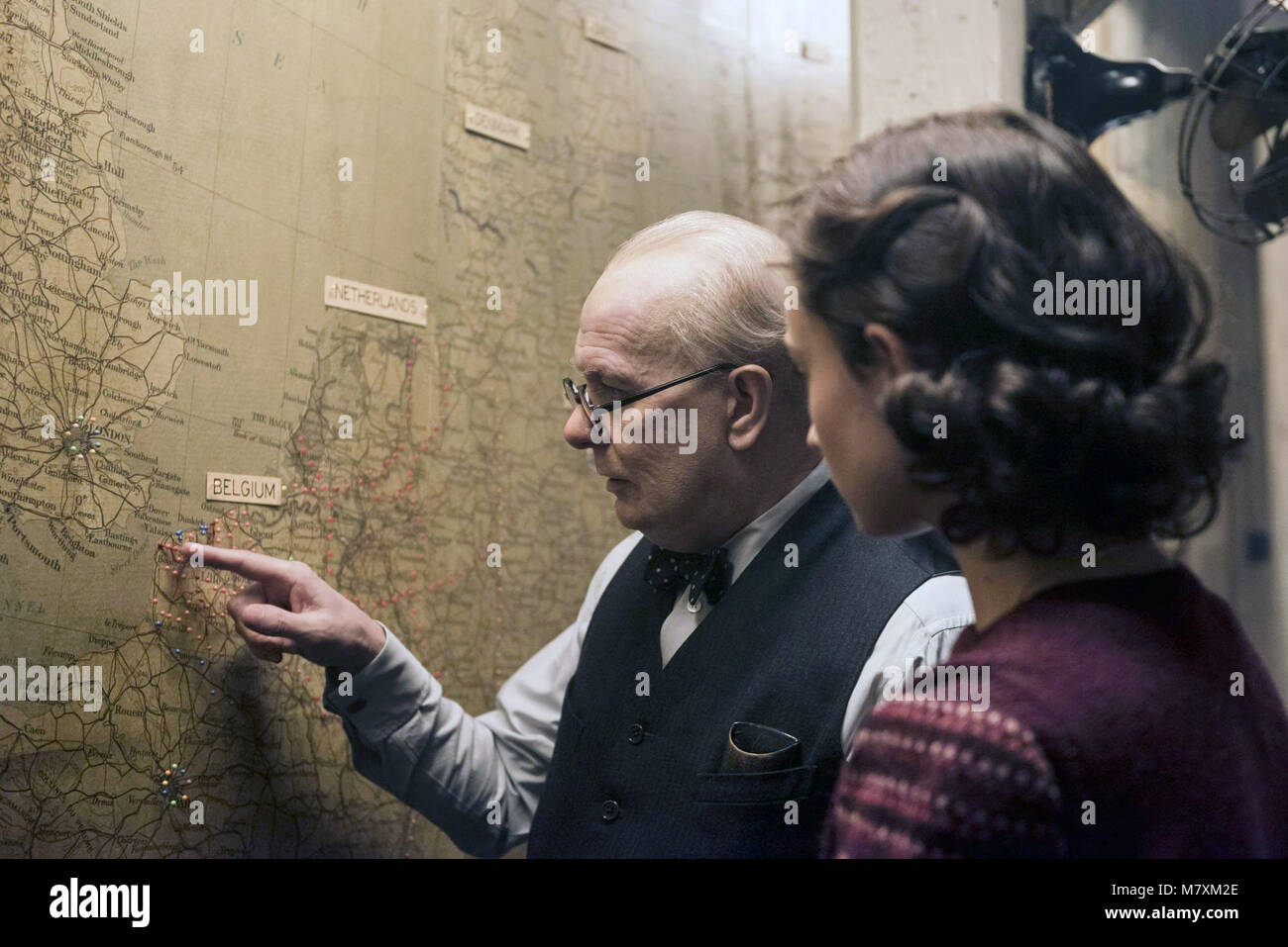 DARKEST HOUR, from left: Gary Oldman as Winston Churchill, Lily James ...
