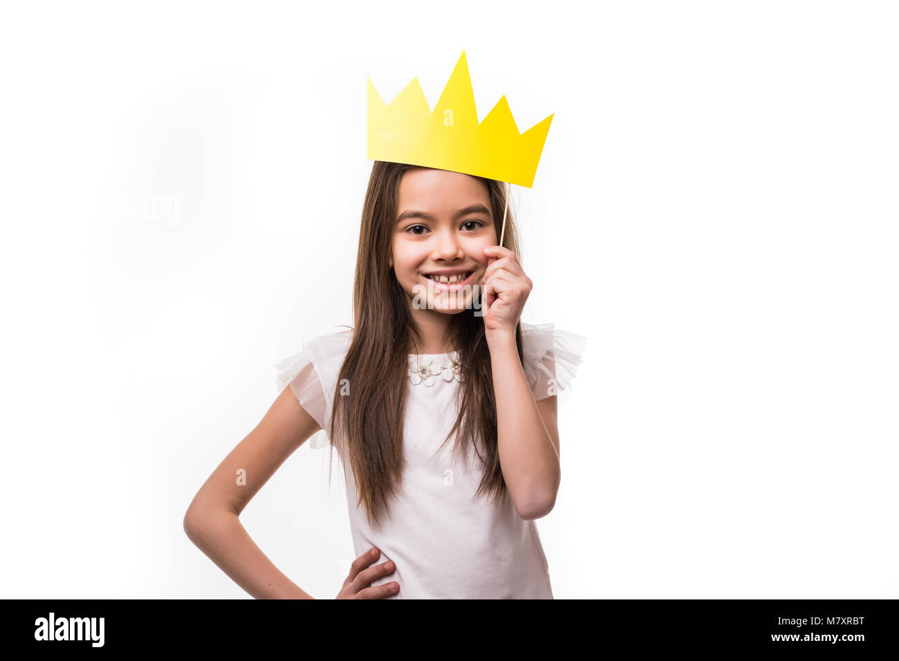 Mini Miss. Young happy girl with a cute smiling laughing wearing a ...