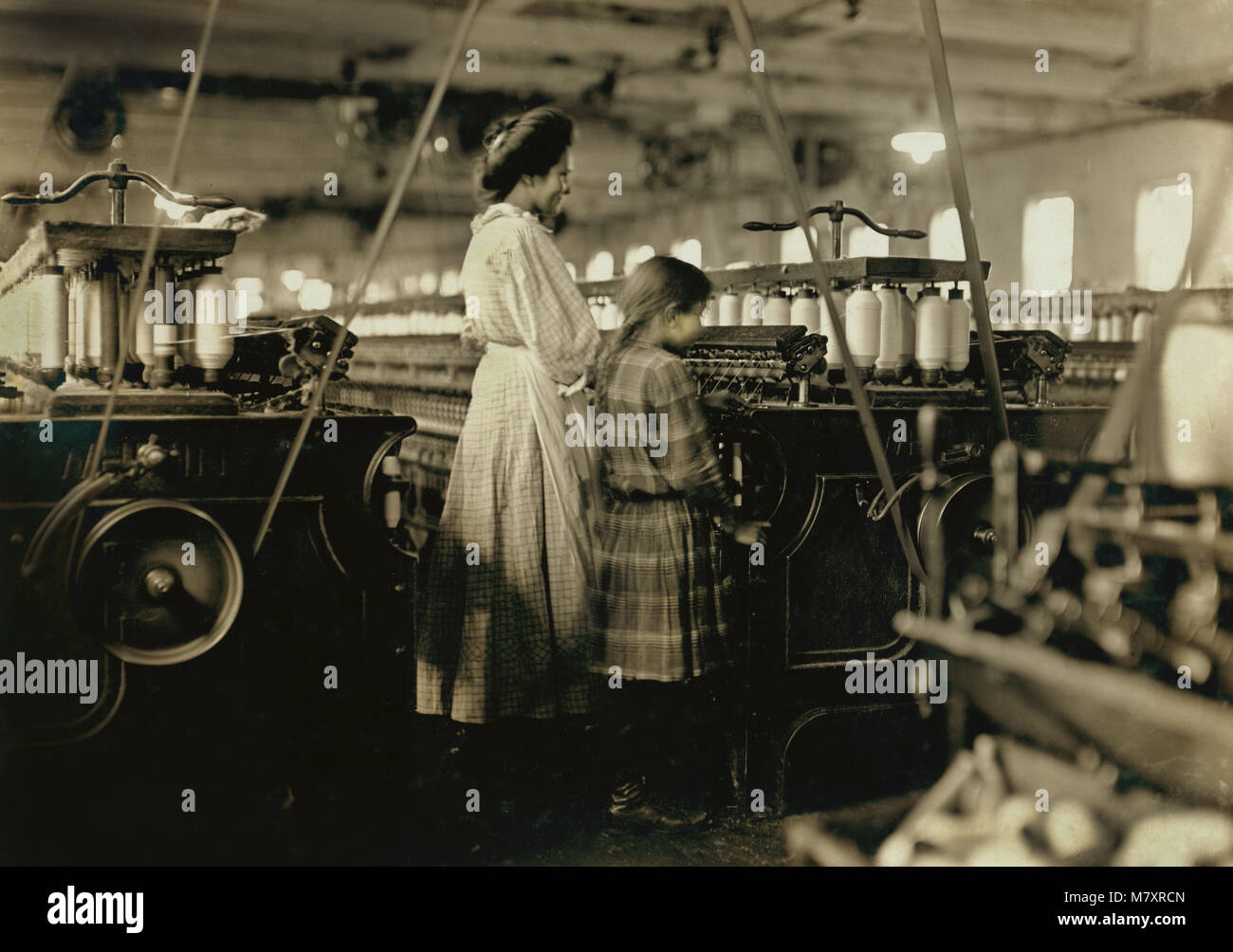 Underage Girl, possibly 8 years old, Working alongside older Girl, Newton Cotton Mills, Newton ...