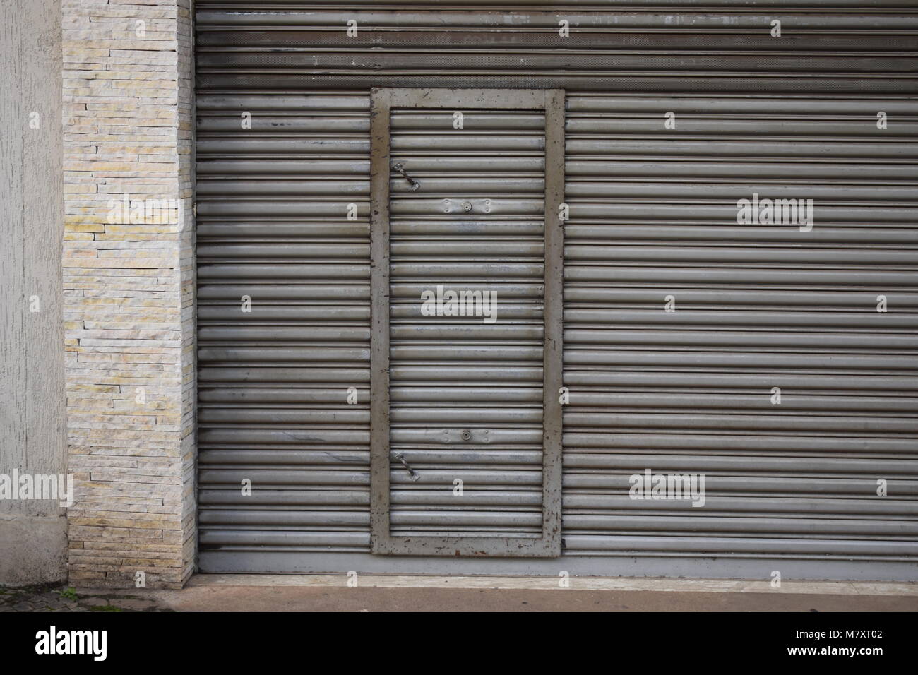 Closed storefronts in a sunday Stock Photo - Alamy