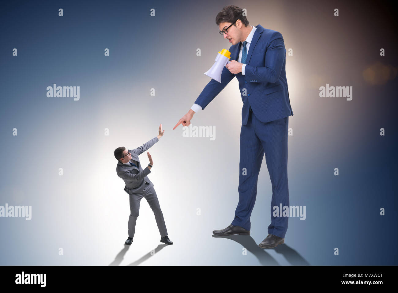 Bad angry boss shouting at employee with loudspeaker Stock Photo - Alamy