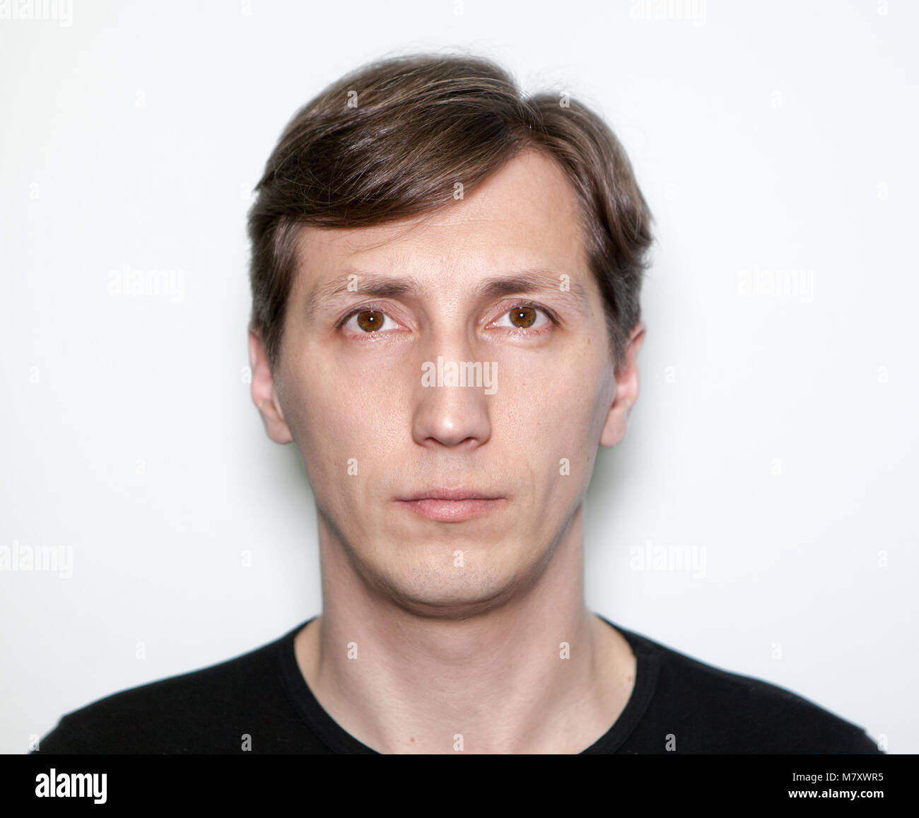 Caucasian calm man facial portrait on a white background Stock Photo ...