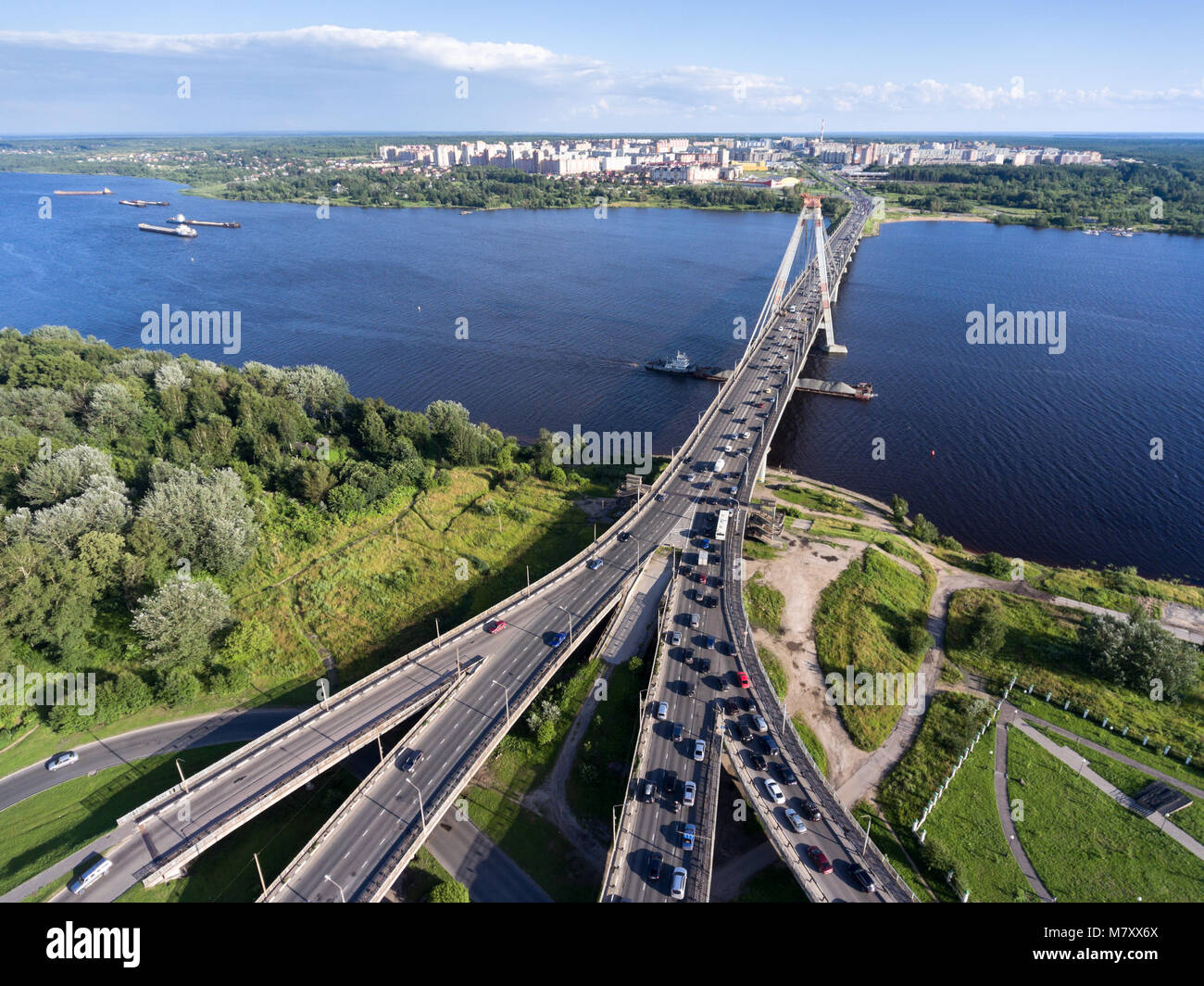 Traffic jam is on the Octyabrsky suspension bridge across the Sheksna river in the Cherepovets ...