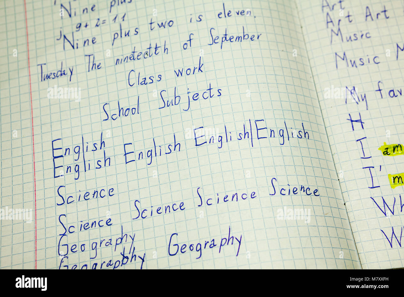 Student book with handwritten words in English language, close up view ...