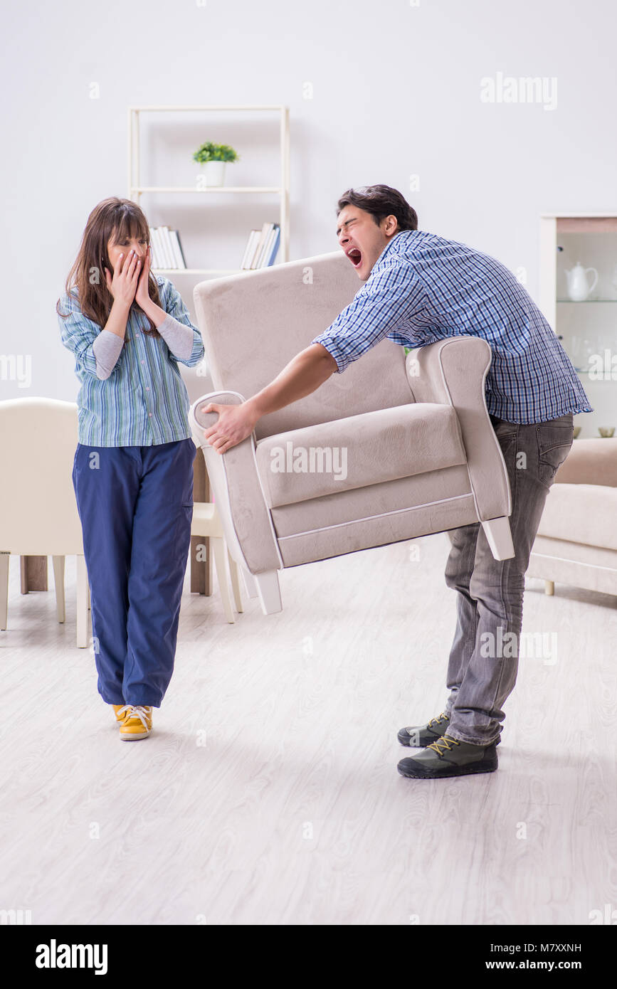 Man moving armchair in hi-res stock photography and images - Alamy