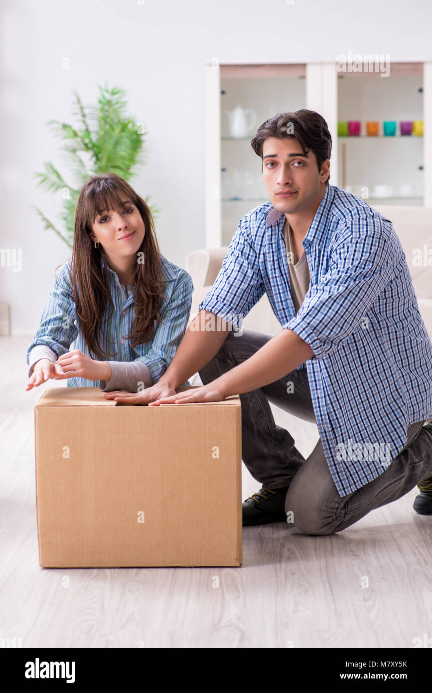 Young family moving in to new apartment after paying off mortgage Stock ...