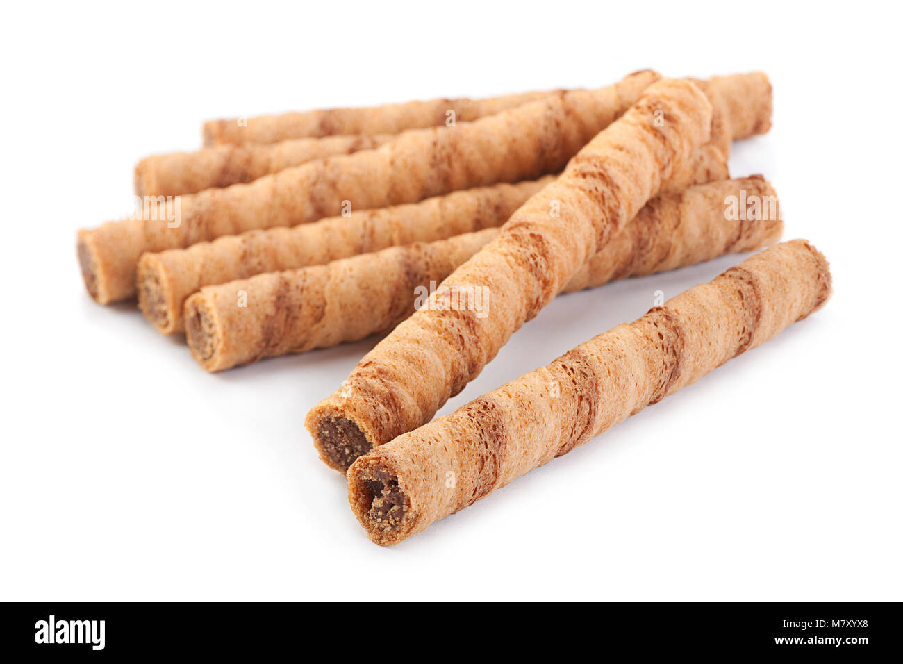 Waffle rolls stick closeup isolated on white Stock Photo - Alamy
