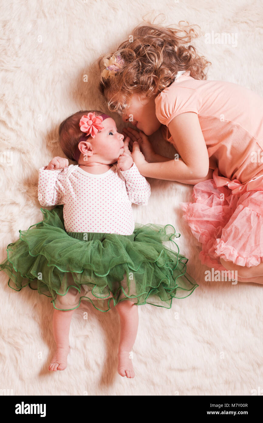 Two sisters together Stock Photo - Alamy