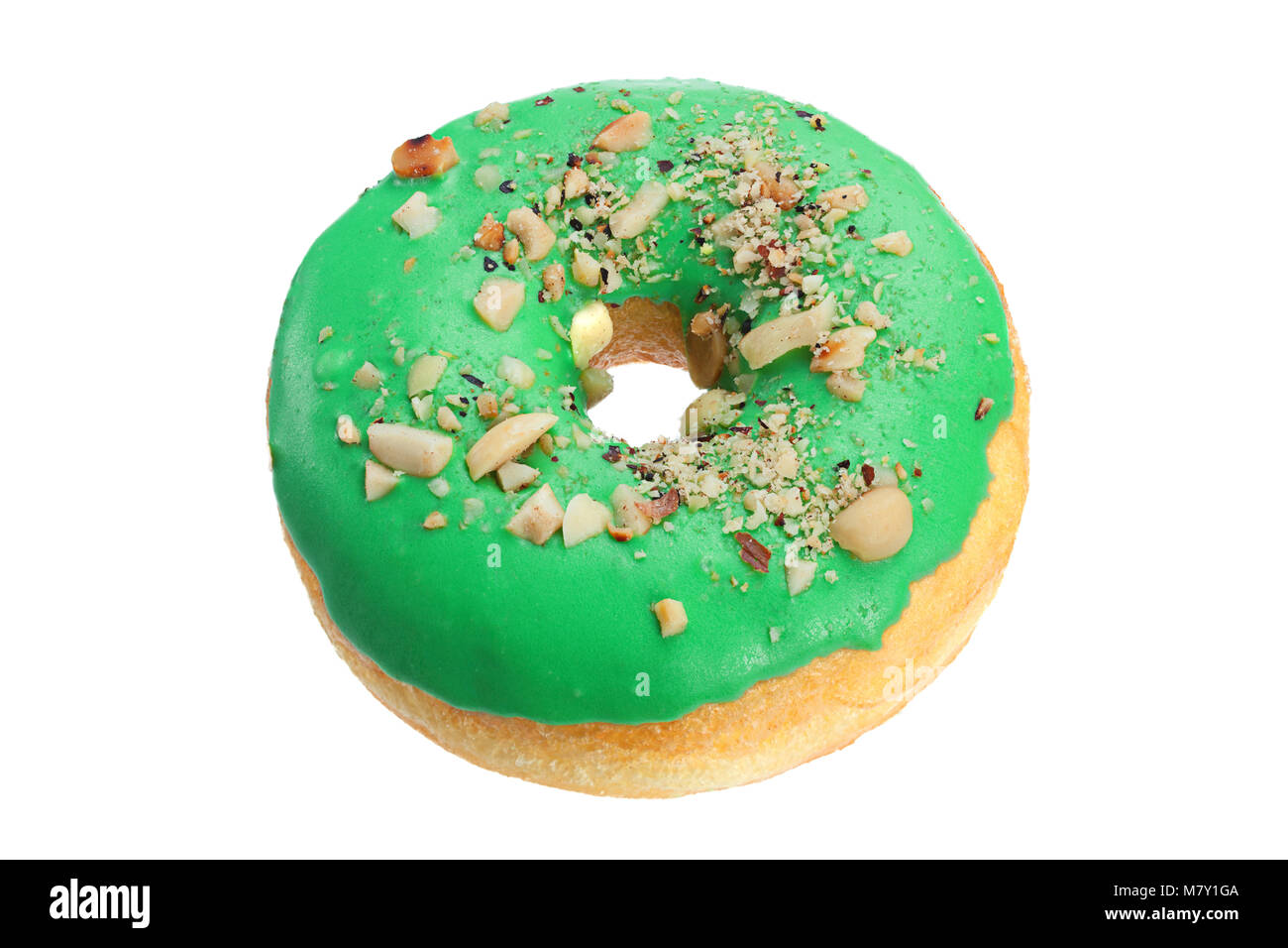 Green donut with nut isolated on white background Stock Photo - Alamy