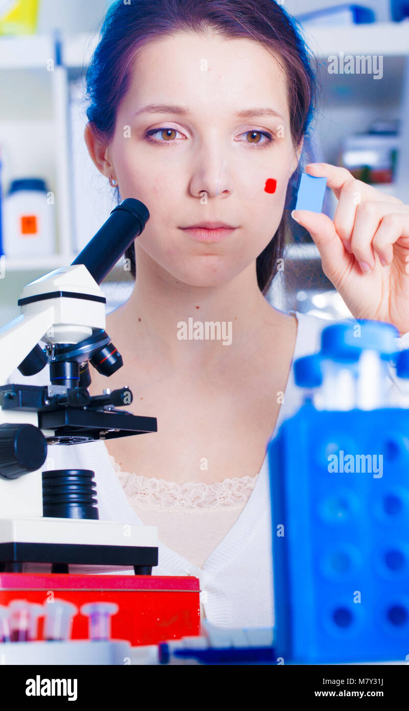 A girl technician in a medical laboratory Stock Photo - Alamy