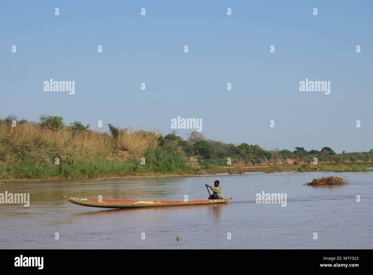 Pirogue, dugout, canoe on Tsiribihina river, Madagascar Stock Photo - Alamy