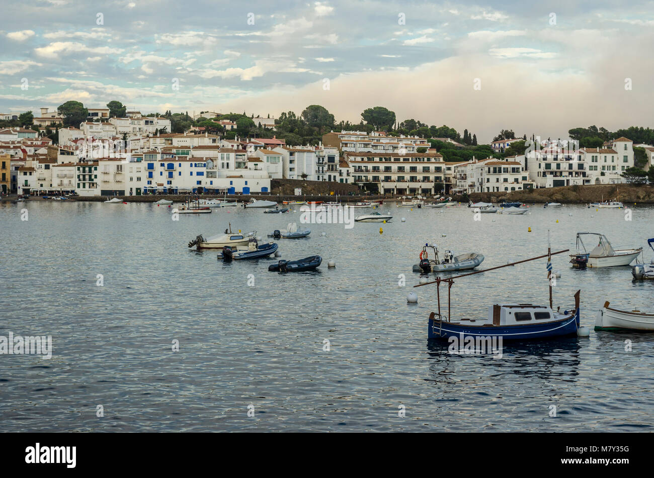 boats anchored in the bay of Cadaques, Spain Stock Photo - Alamy